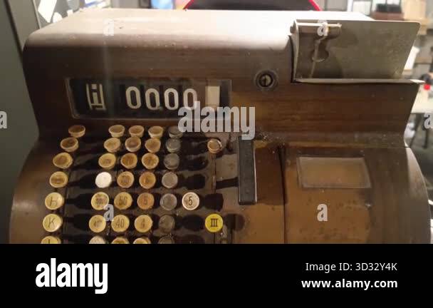 An aged cash register, displaying a '0000' value, tells a story of ...