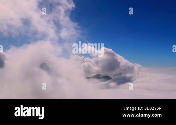 Closeup of the astonishing cloudscape. The surging, churning sea of ...