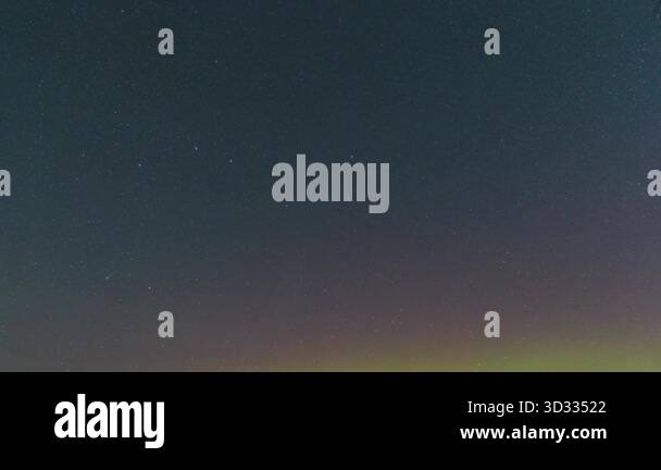 Time-lapse video of a starry night sky with faint aurora borealis ...
