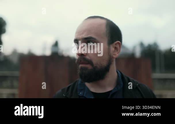 The emotion in his eyes cuts deep grief, fear, and despair. He stands ...