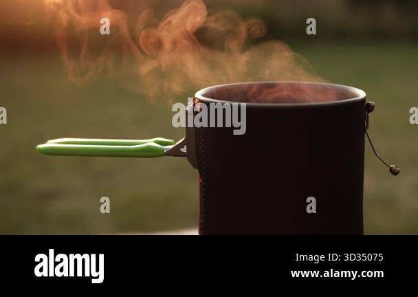Boiling Water Steaming Close Up Outdoors On A Portable Gas Cooking ...
