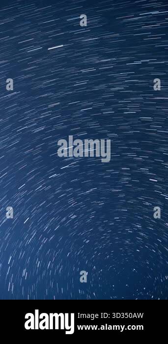 Moving Star Trails On A Dark Night Sky In A Time Lapse, Vertical Video ...