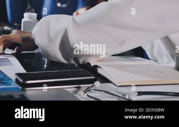 professional doctor writing notes Stock Video Footage - Alamy