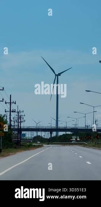 road with wind turbines Stock Video Footage - Alamy
