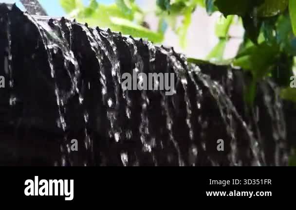 water drops on a fountain Stock Video Footage - Alamy