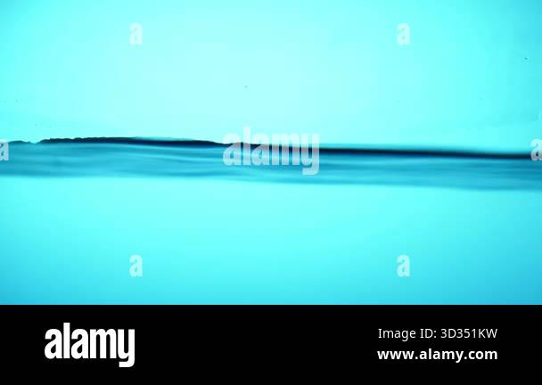 water drop on the surface of blue water Stock Video Footage - Alamy
