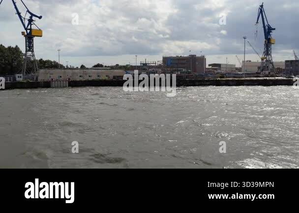 Aerial perspective moving sideways along the Elbe river, showing ...