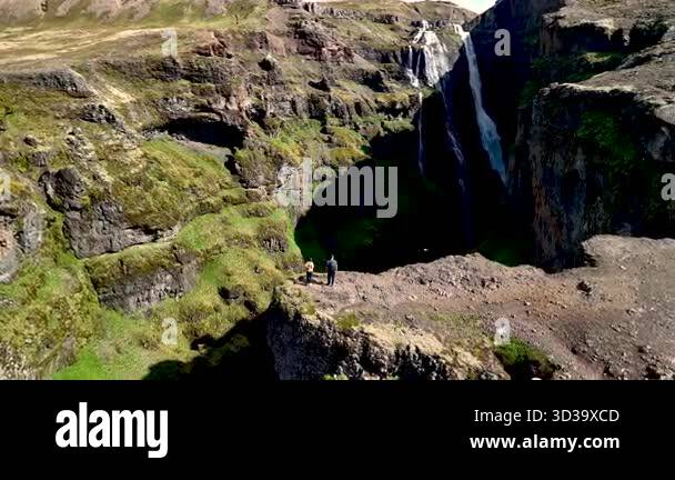 Explore the breathtaking Glymur Waterfall, surrounded by lush green ...