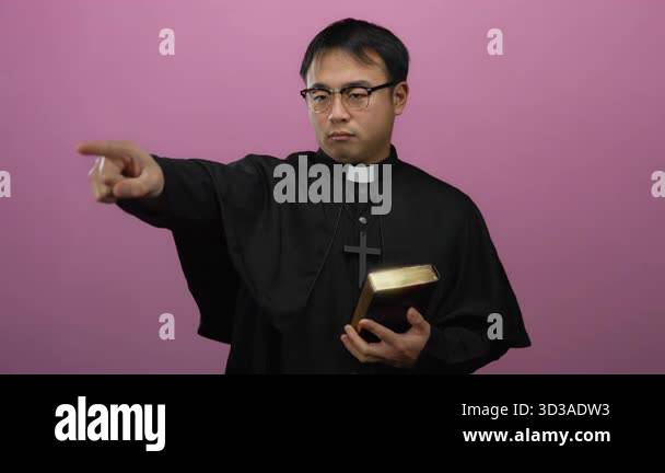 Priest holding bible pointing Stock Videos & Footage - HD and 4K Video ...