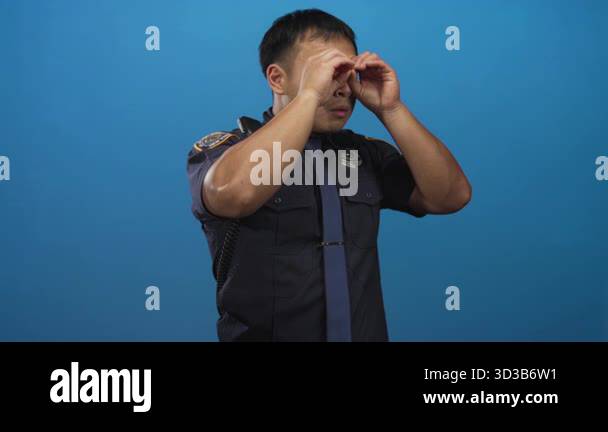 Man wearing police uniform uses Stock Videos & Footage - HD and 4K ...