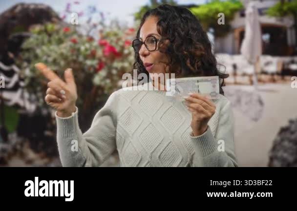 Woman smiling holding uae Stock Videos & Footage - HD and 4K Video ...