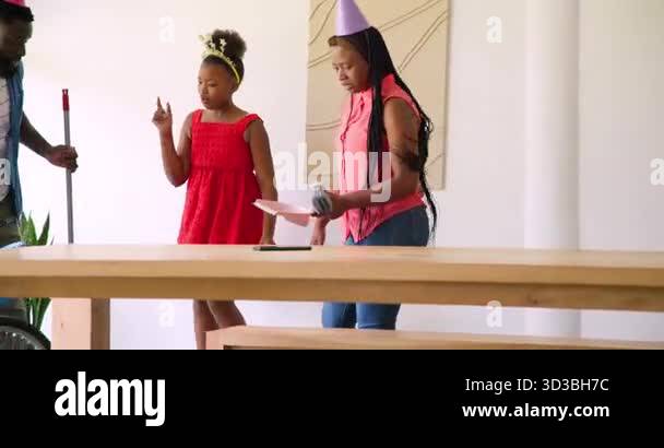 African american family sweeping home Stock Videos & Footage - HD and ...