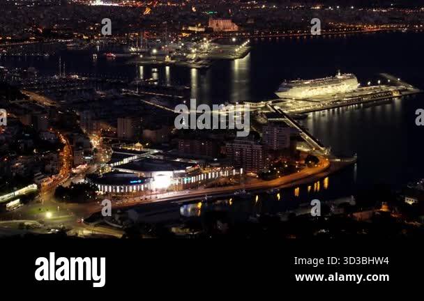 Aerial view of vibrant Port de Palma de Mallorca at night, showing ...