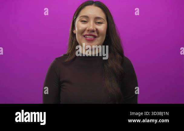 Young hispanic woman with closed eyes and exposed face and tilted head ...
