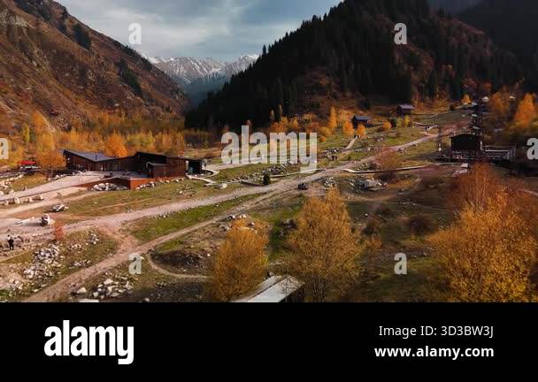 Aerial drone view panorama of yellow and red trees in autumn forest ...