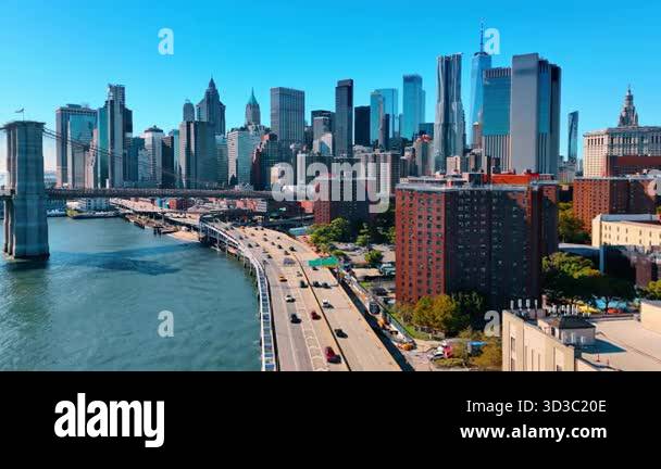 Footage over the highways at the waterfront of the East River with ...