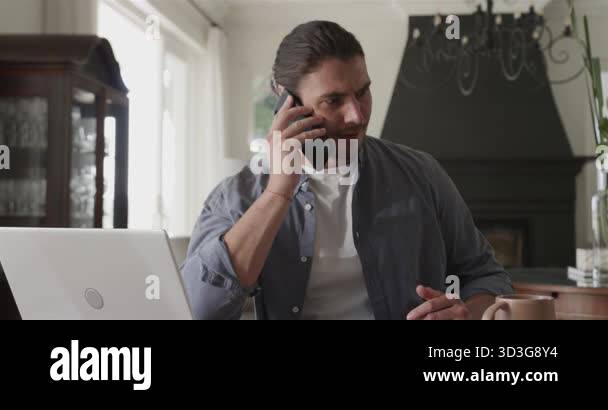 Tapping smartphone making call, male listening, gesturing and writing ...
