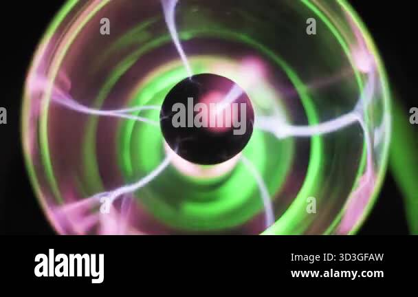 Top down view of a plasma globe emitting white electric bolts from a ...