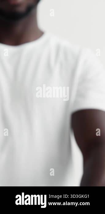 Young African American Man Showing Victory Sign in White Background ...