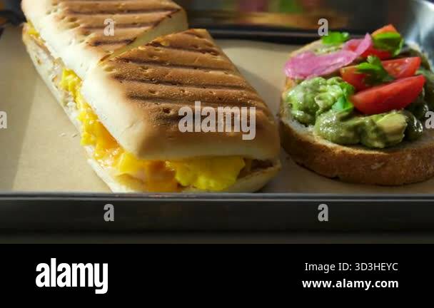 Healthy avocado toasts with rye bread, sliced avocado, eggs, cottage ...