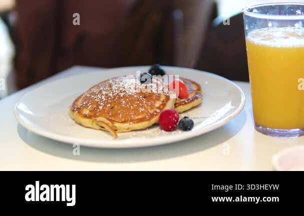 Traditional Eastern European oladyi pancakes presenting golden surface ...