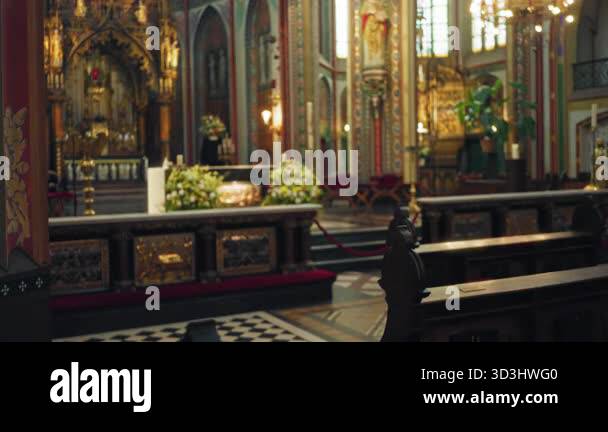 Defocused image of an ornate catholic church interior featuring ...