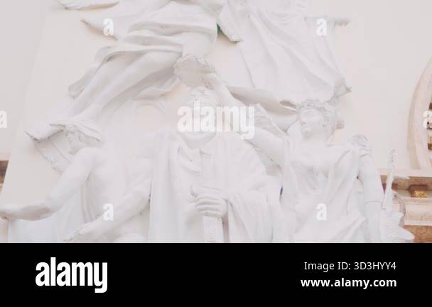 carvings of beautiful white statues displayed on the walls of a royal ...