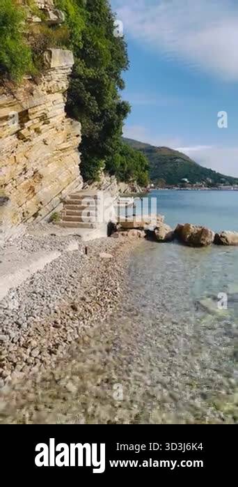 calm sea refuge, peaceful rocky cove surrounded by nature, tranquil ...