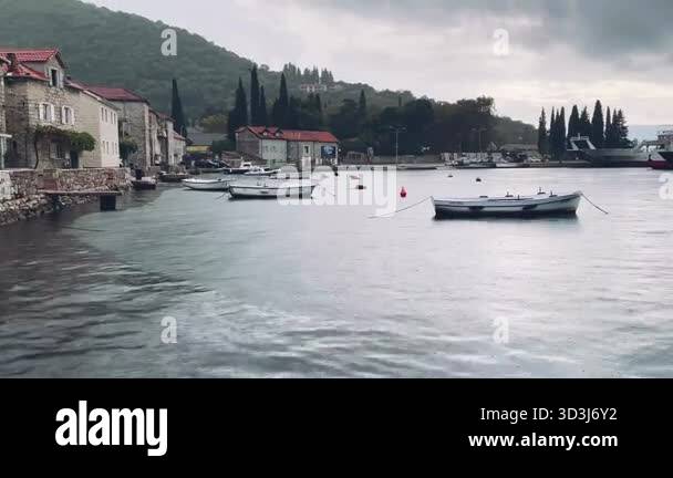 A wonderfully peaceful harbor scene featuring boats and charming ...