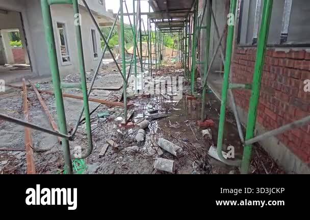 temporary raised platform or scaffold on which workers stand to do ...