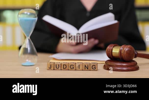 In a bustling courtroom, a judge reviews important cases with a keen ...