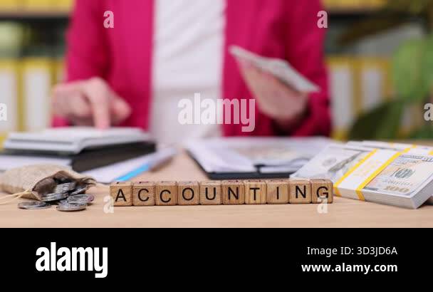 In a vibrant accounting office, a professional evaluates bills, counts ...