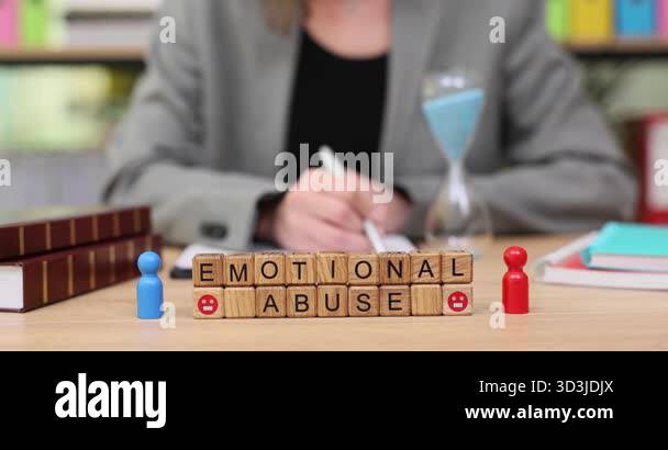 Focusing on the theme of emotional abuse, colorful blocks and figures ...