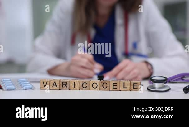 Female doctor writes prescription near Varicocele on wooden blocks on ...