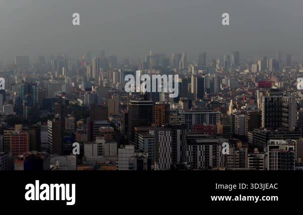 Vast urban sprawl of Lima, Peru, with dense downtown district under a ...