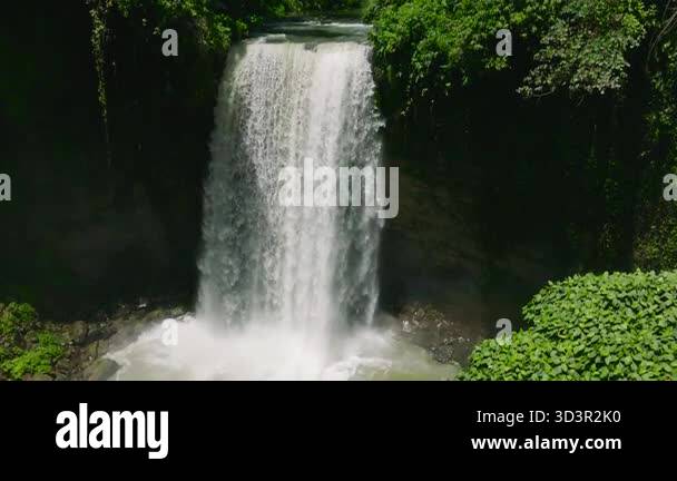 Tropical Falls with white water stream in slow motion. Hikong Alo Falls ...