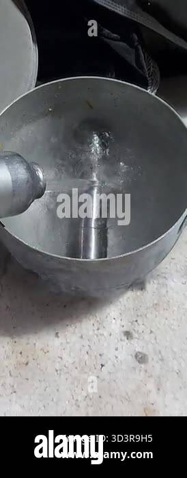 Cooling a spare part car beam kingpin with liquid nitrogen. Garage work ...