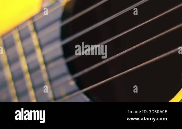 Guitar strings vibrating close up super slow motion shot selective ...