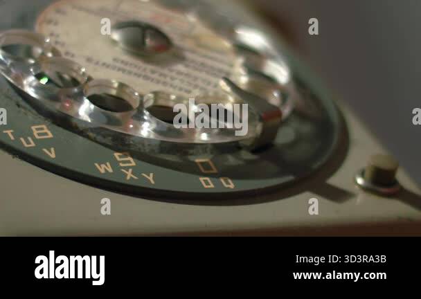 Vintage rotary dial phone close up super slow motion selective focus ...