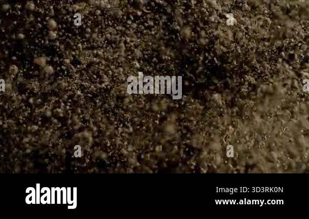 Super Slow Motion Shot of Exploding Soil Towards Camera at 1000fps ...