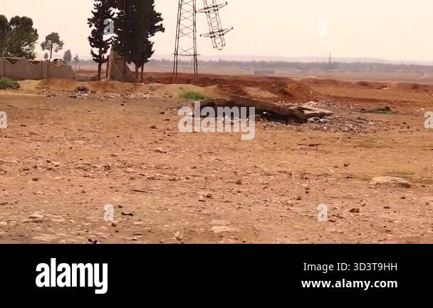 Destroyed electricity tower in a deserted Syrian landscape after years ...