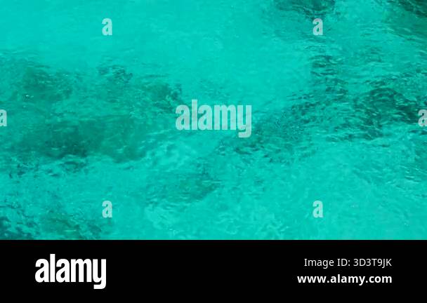 Calm turquoise sea in Mallorca, Spain, reflecting sunlight. Ideal for ...