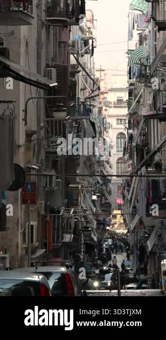 Naples, Italy, December 29, 2024. Vertical footage of one of the narrow ...