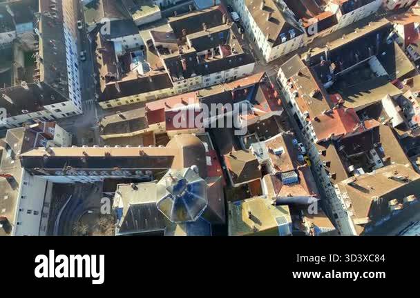 Vertical aerial perspective capturing dense historic district with ...