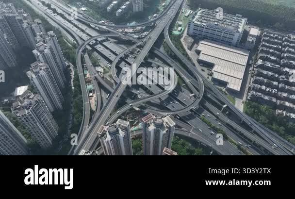 Complex aerial view of a massive, multi-level highway interchange with ...