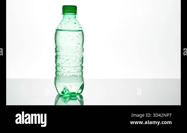 Refreshing Hydration: Green Water Bottle Being Filled with Pure Water ...