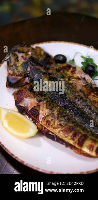 Delicious whole fish grilled to perfection with lemon and fresh ...