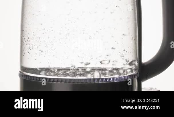 hot boiling water in electric teapot, food and drink closeup, close-up ...