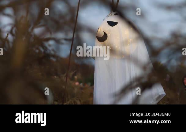 Spooky ghost figure appearing in the dark on Halloween night, white ...