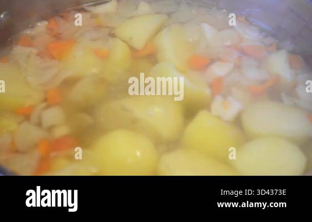 Healthy vegetable soup boiling in a pot during cooking Stock Video ...